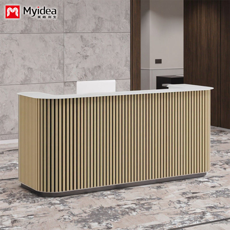 Wooden grille and white mountain patterned rock slab front desk, lobby ...