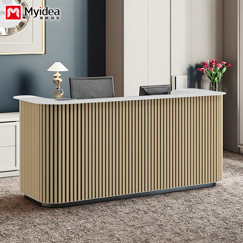 Wooden grille and white mountain patterned rock slab front desk, lobby ...
